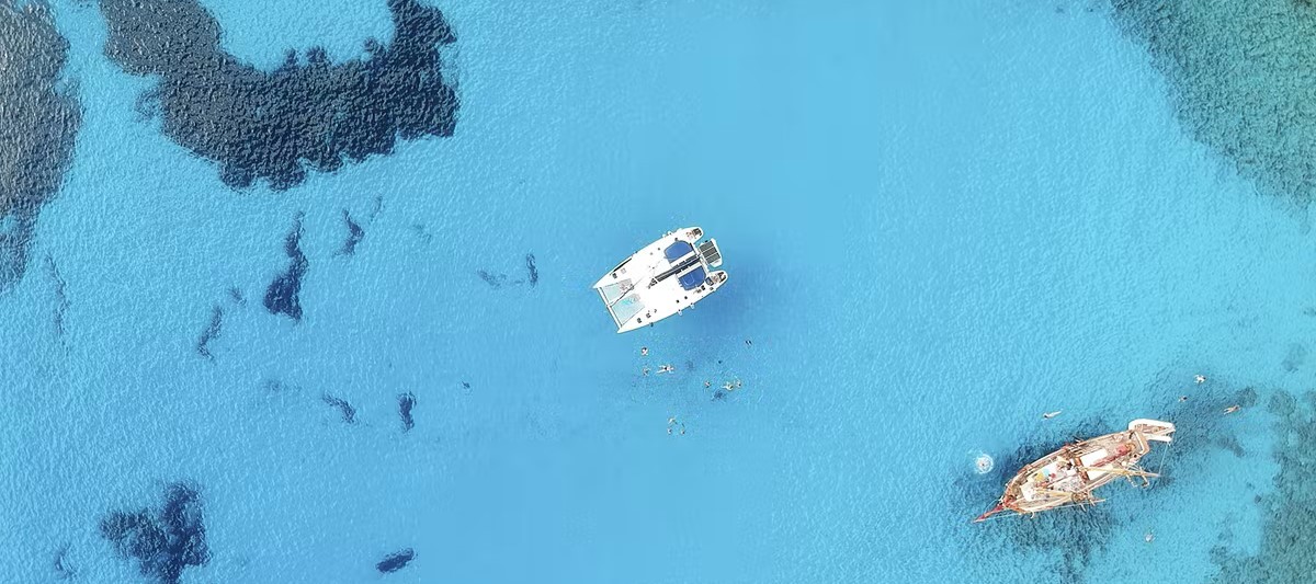 Private Catamaran Trip from Adamantas around Milos | Polco Sailing Milos